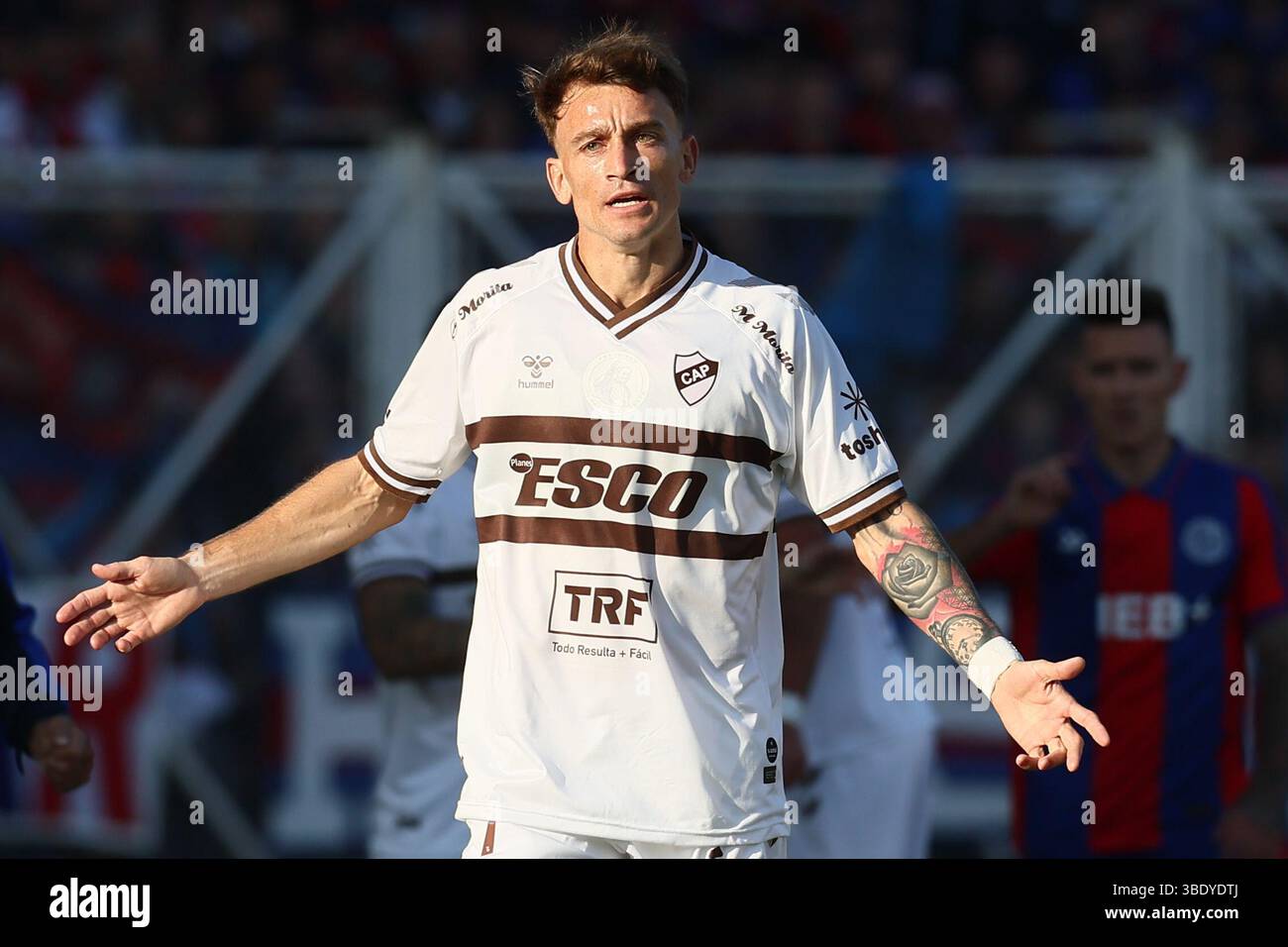 Platense's forward Guido Mainero gestures during the Argentine ...