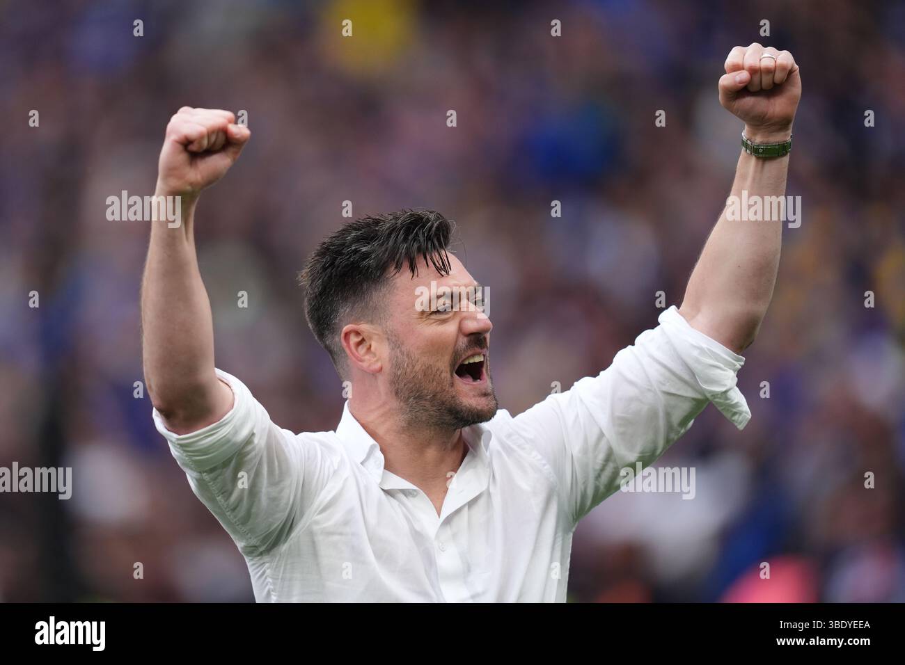 AFC Wimbledon manager Johnnie Jackson celebrates after the final ...