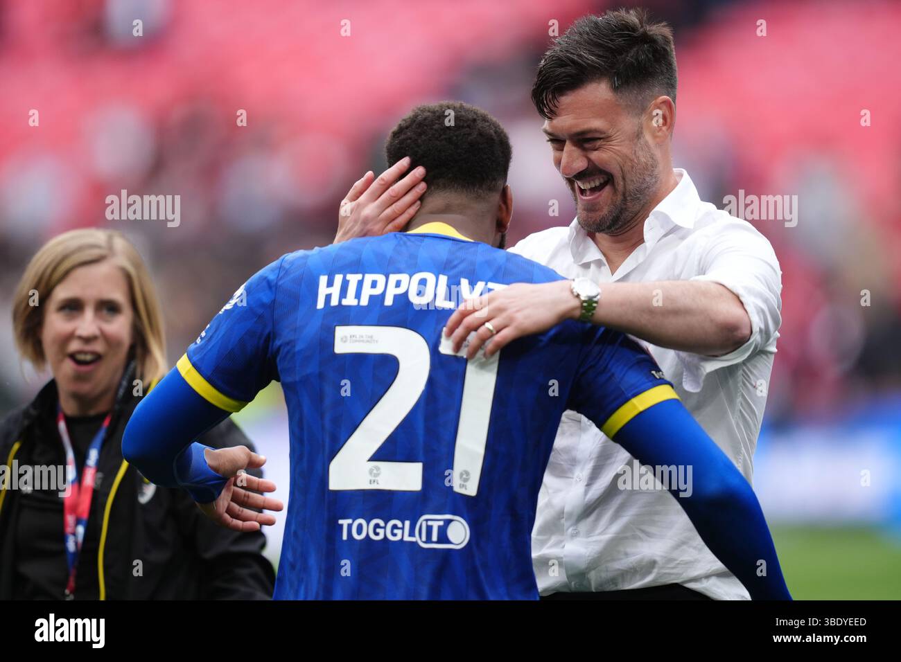 AFC Wimbledon manager Johnnie Jackson (right) and AFC Wimbledon's Myles ...