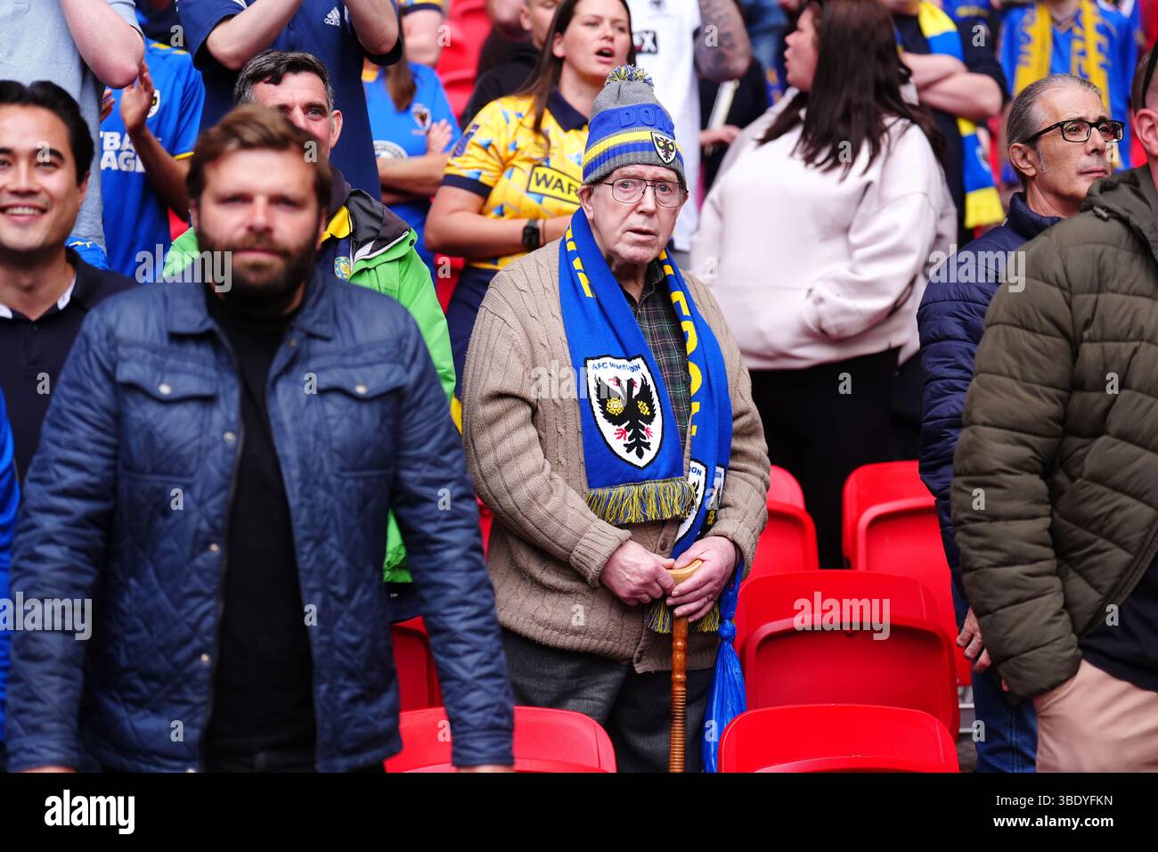 Wimbledon fans in the stand following victory in the Sky Bet League Two ...