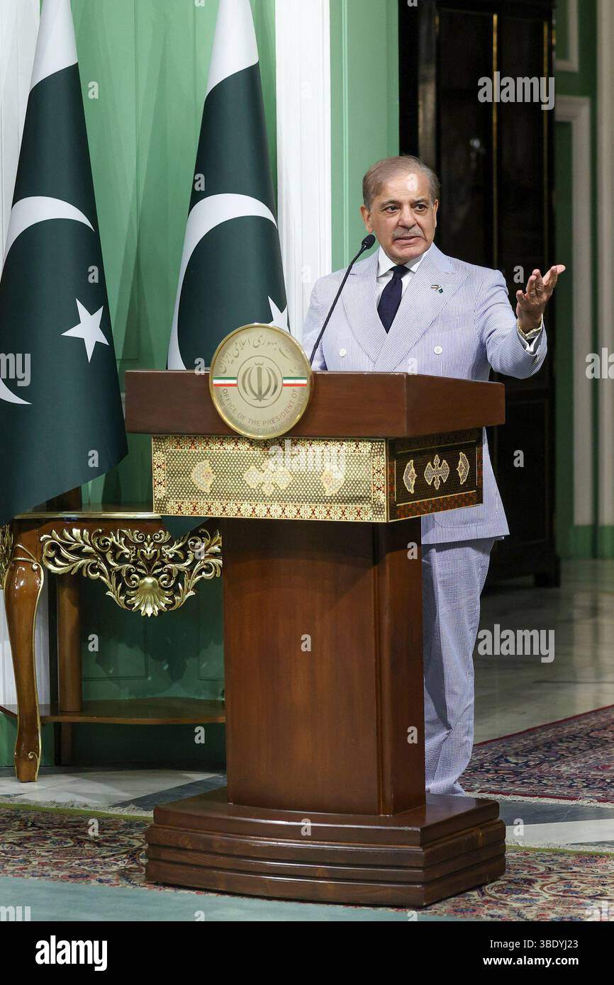 In this photo released by the Iranian Presidency Office, Pakistan's ...