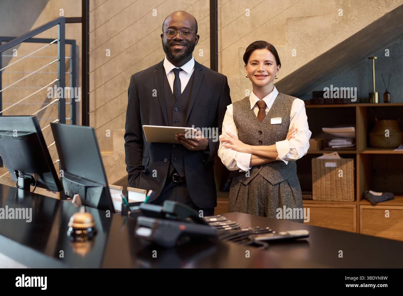Friendly hotelier hi-res stock photography and images - Alamy