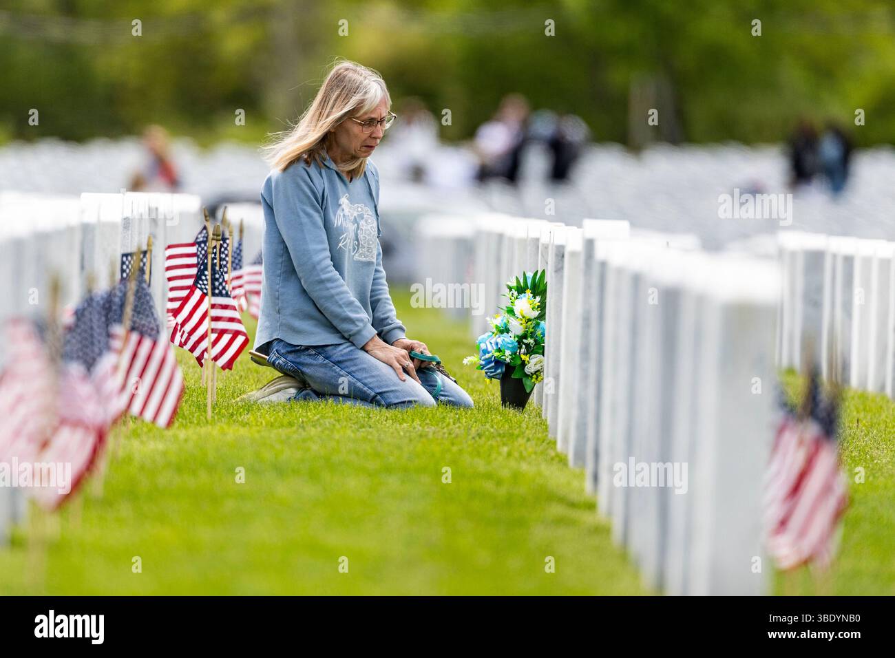 Stacey Buc visits the headstone of her mom, Felicia Buc, and dad, Tech ...