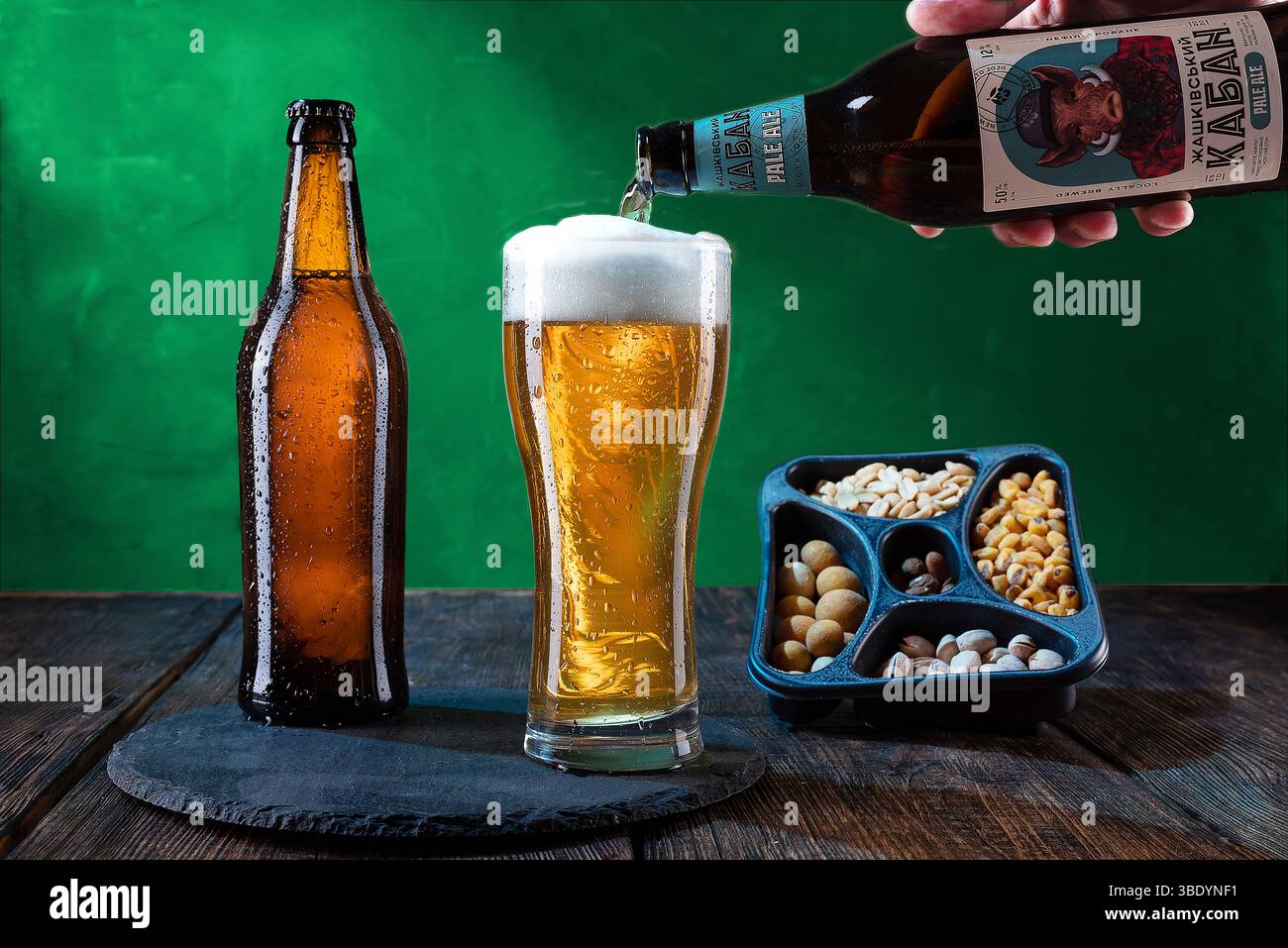 KYIV, UKRAINE- May 30. 2022 Ukrainian beer in a glass bottle. Pale Ale ...