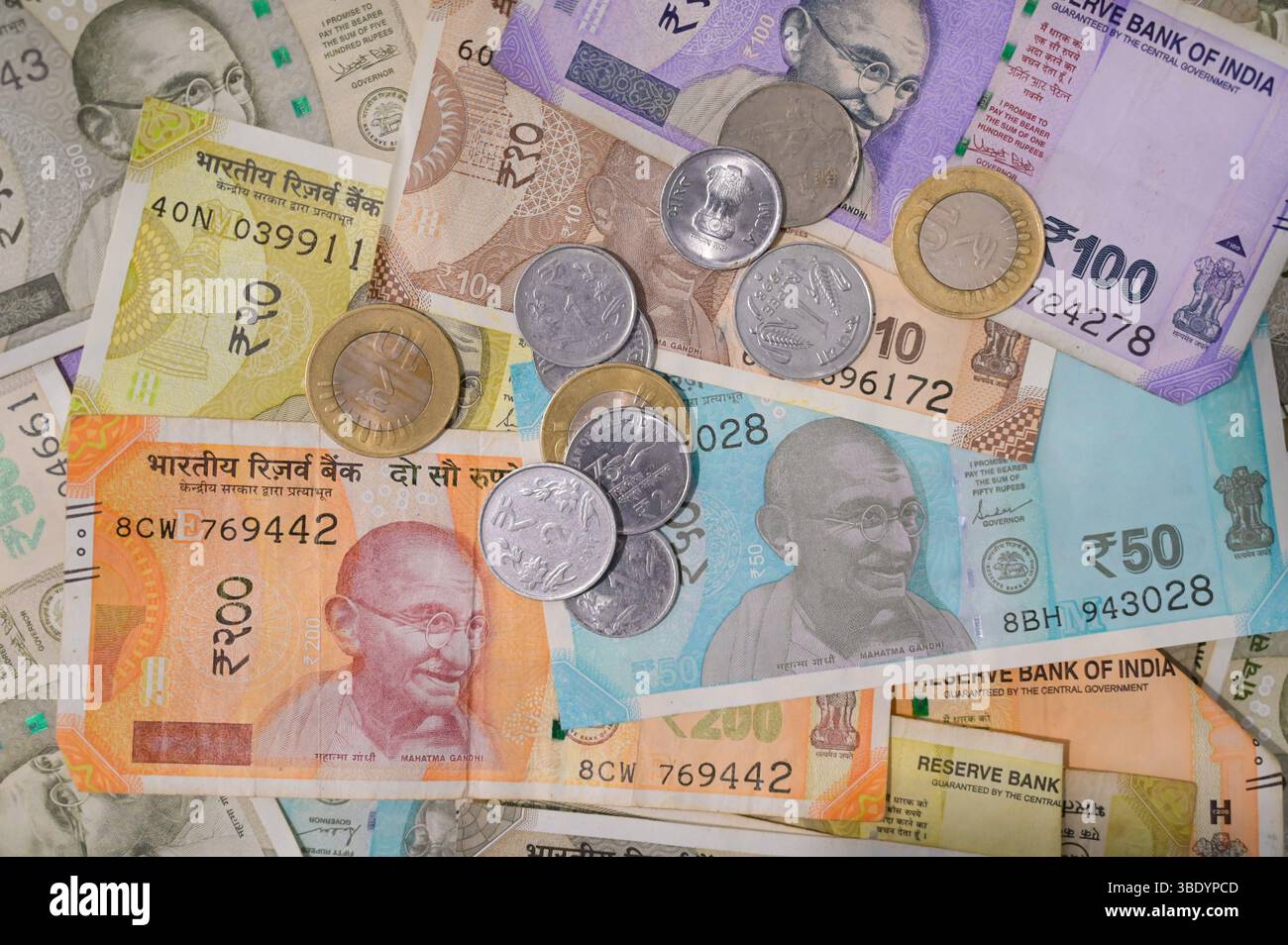 Indian rupee banknotes and coins, currency of India, pile of money ...