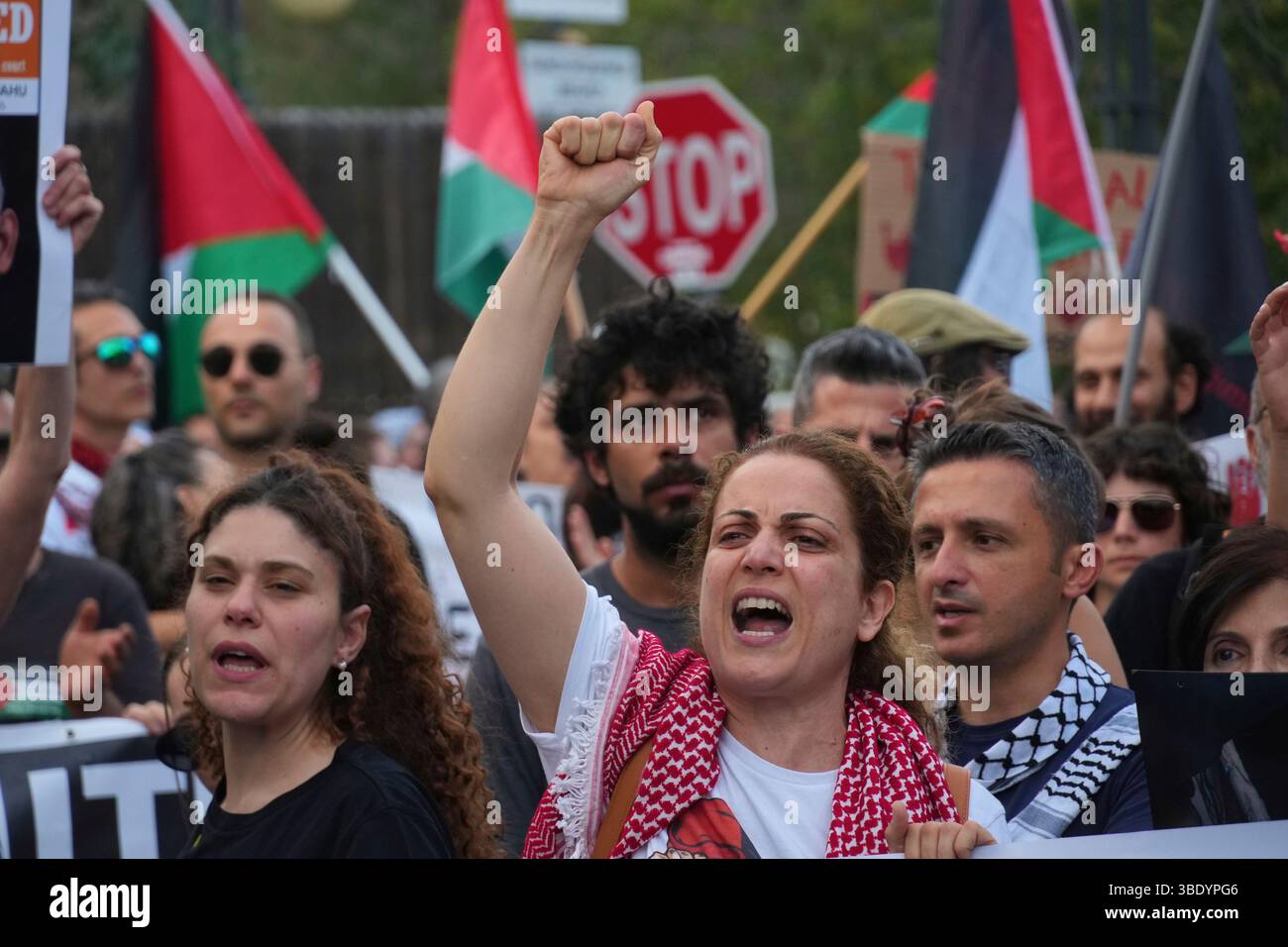 Demonstrators hold Palestinian flags during a protest outside Cyprus ...