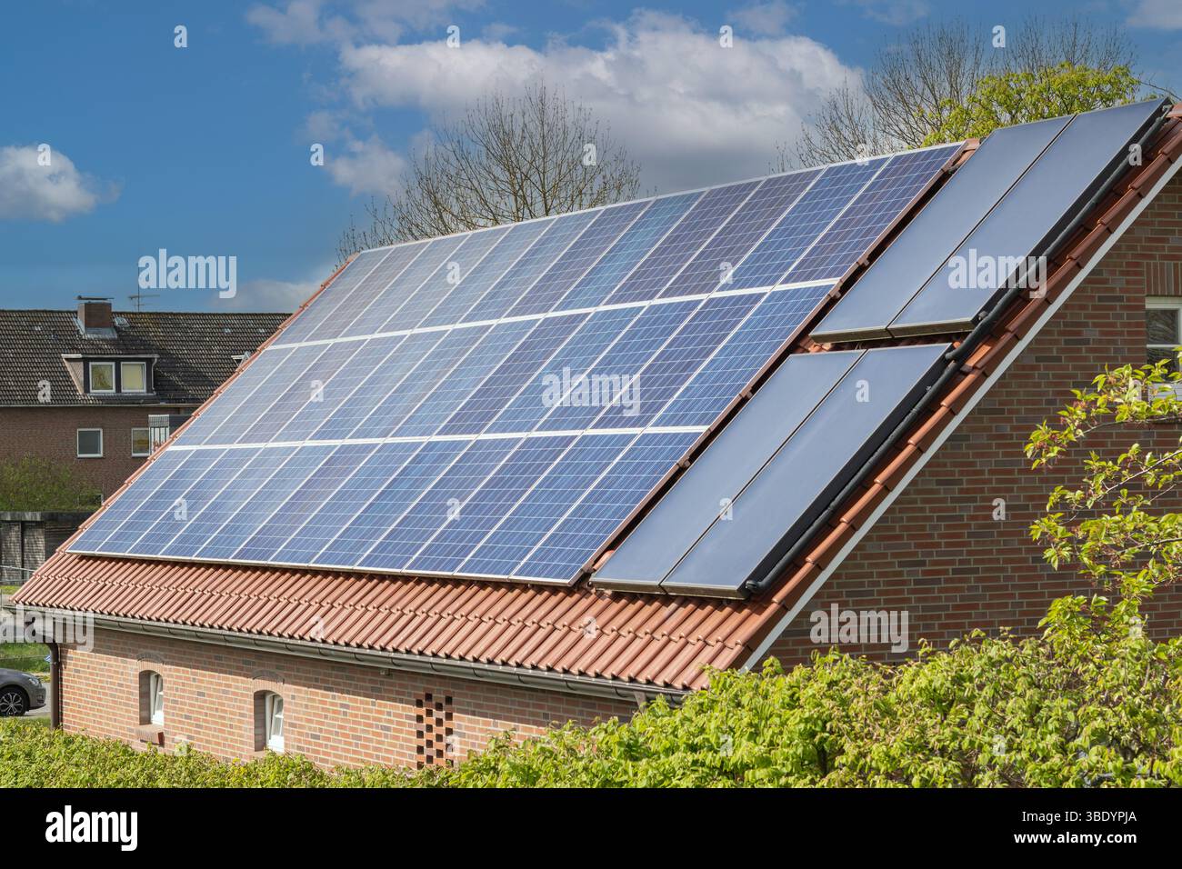 renovated barn with large solar roof Stock Photo - Alamy