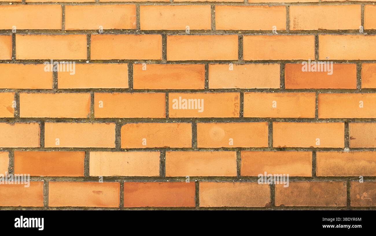 Orange brick wall texture of an modern building. yellow masonry of ...