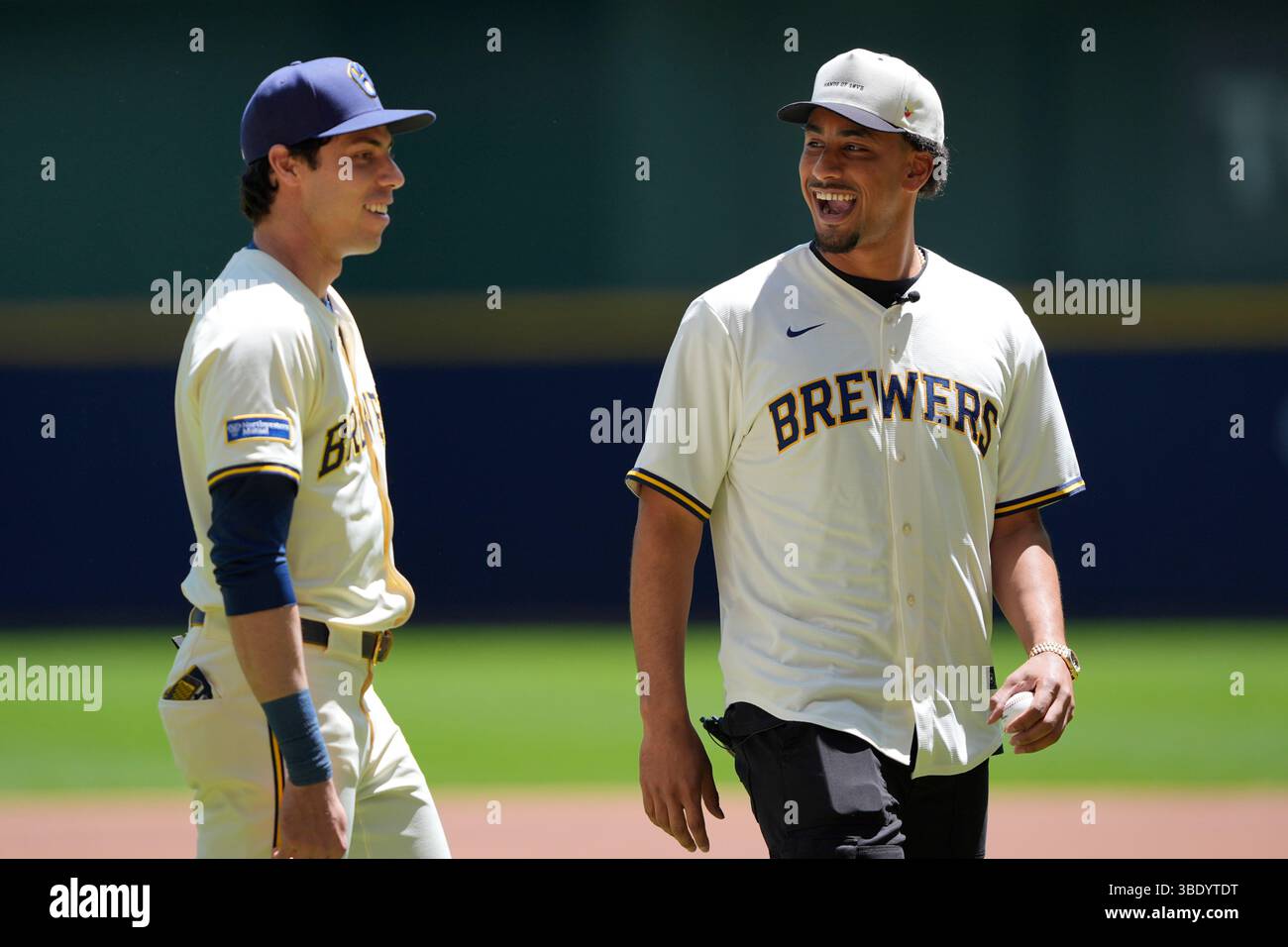 Green Bay Packers' quarterback Jordan Love, right, laughs with ...