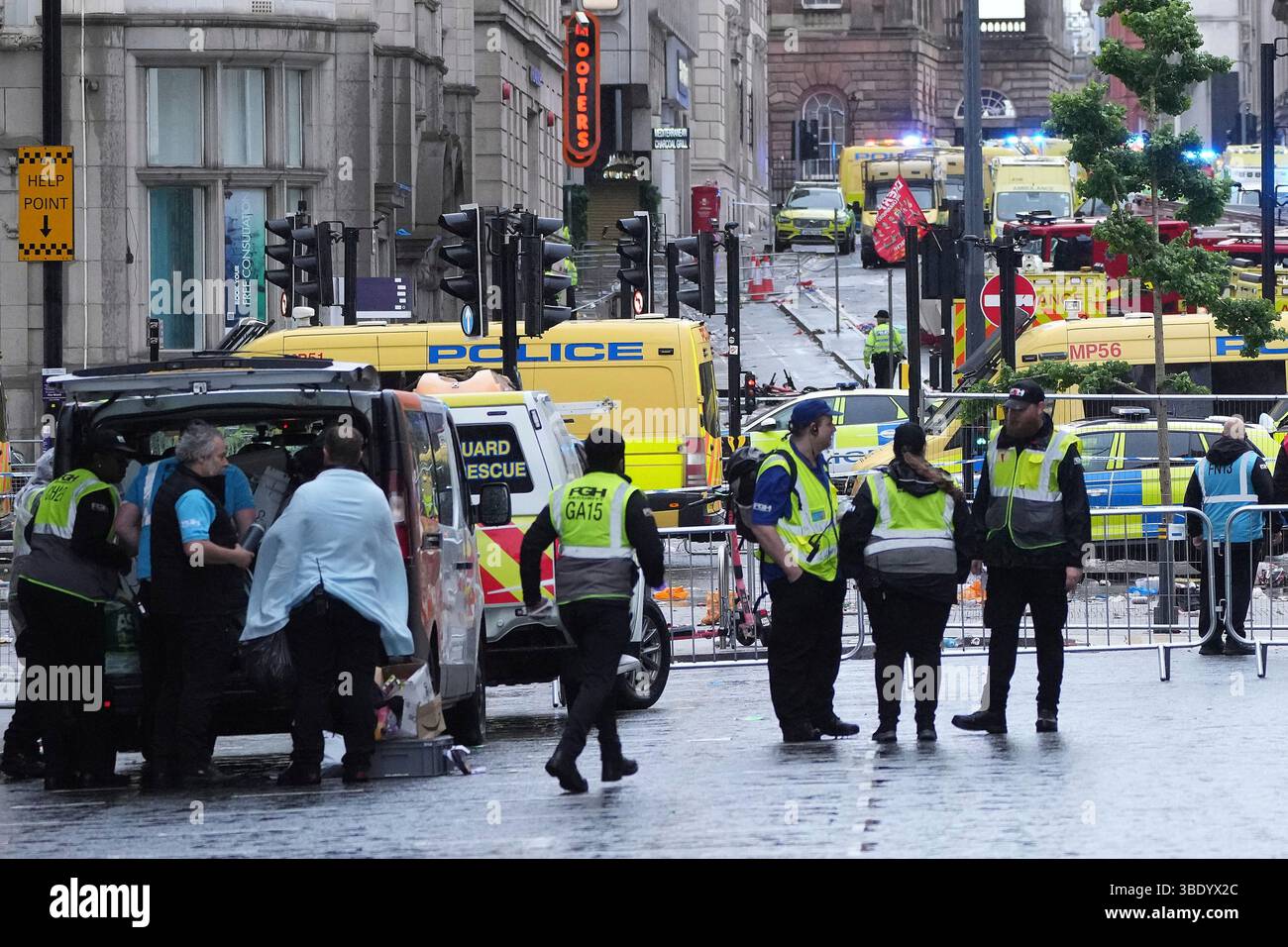 Police and emergency personnel deal with an incident near the Liver ...