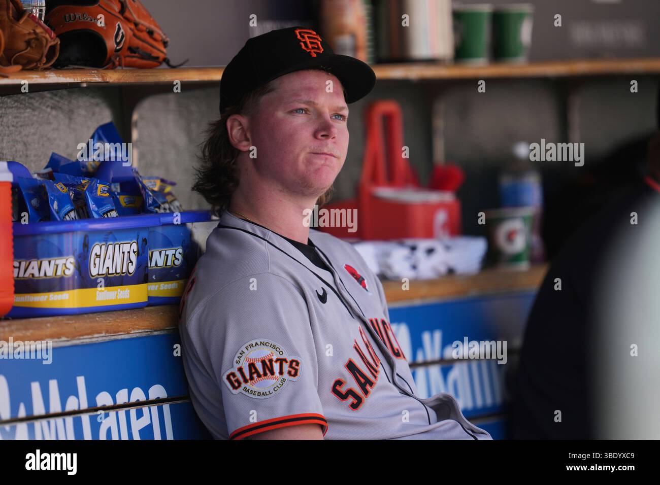 San Francisco Giants pitcher Hayden Birdsong watches from the dugout ...