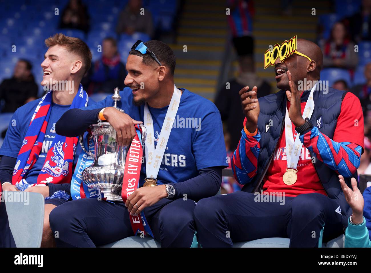Crystal Palace football players including Maxence Lacroix holding the ...
