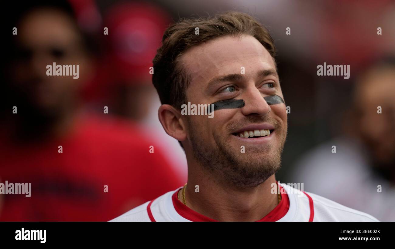 Cincinnati Reds' TJ Friedl celebrates in the dugout after scoring in ...