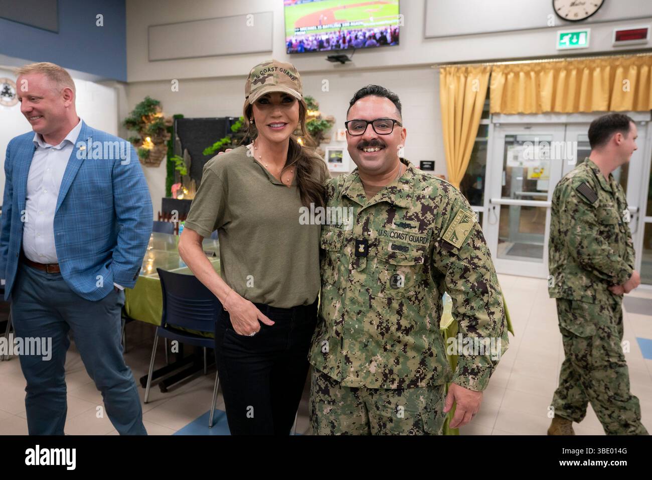 Department of Homeland Security (DHS) Secretary Kristi Noem serves food ...