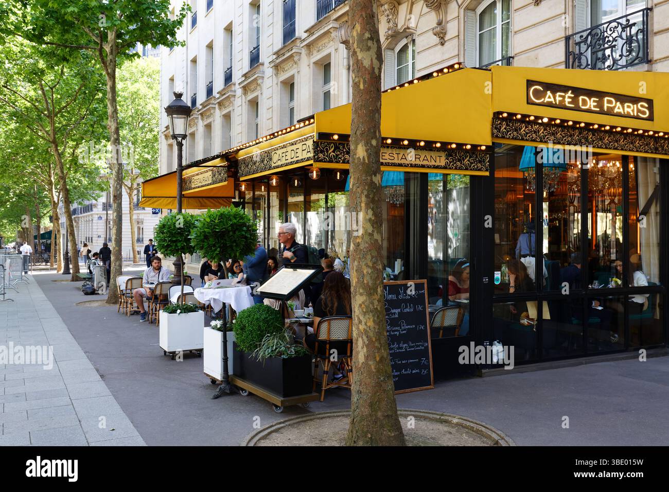Paris, France- May 19 , 2025 :The traditional French cafe de Paris ...