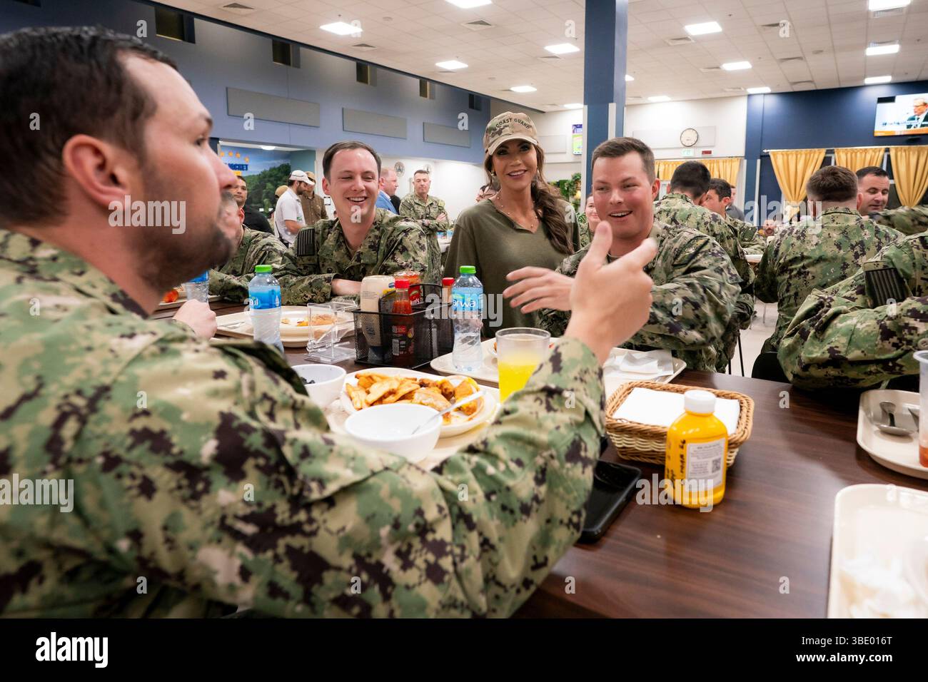 Department of Homeland Security (DHS) Secretary Kristi Noem serves food ...