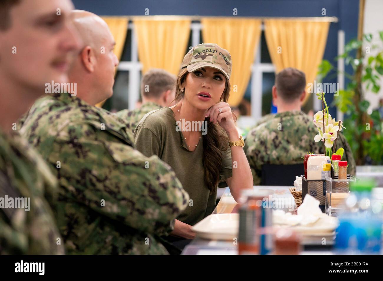 Department of Homeland Security (DHS) Secretary Kristi Noem serves food ...