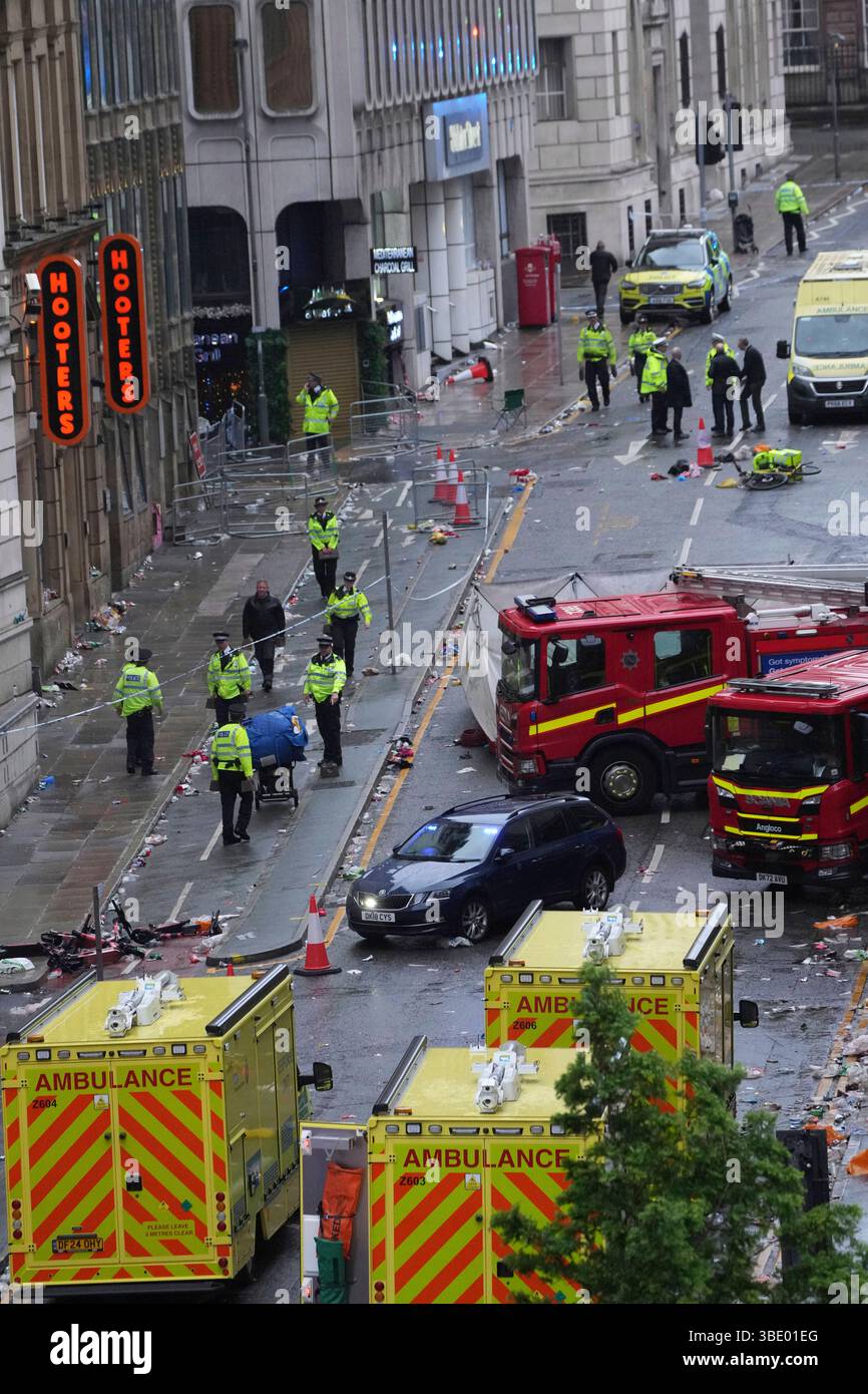 Police and emergency personnel deal with an incident after a car ...