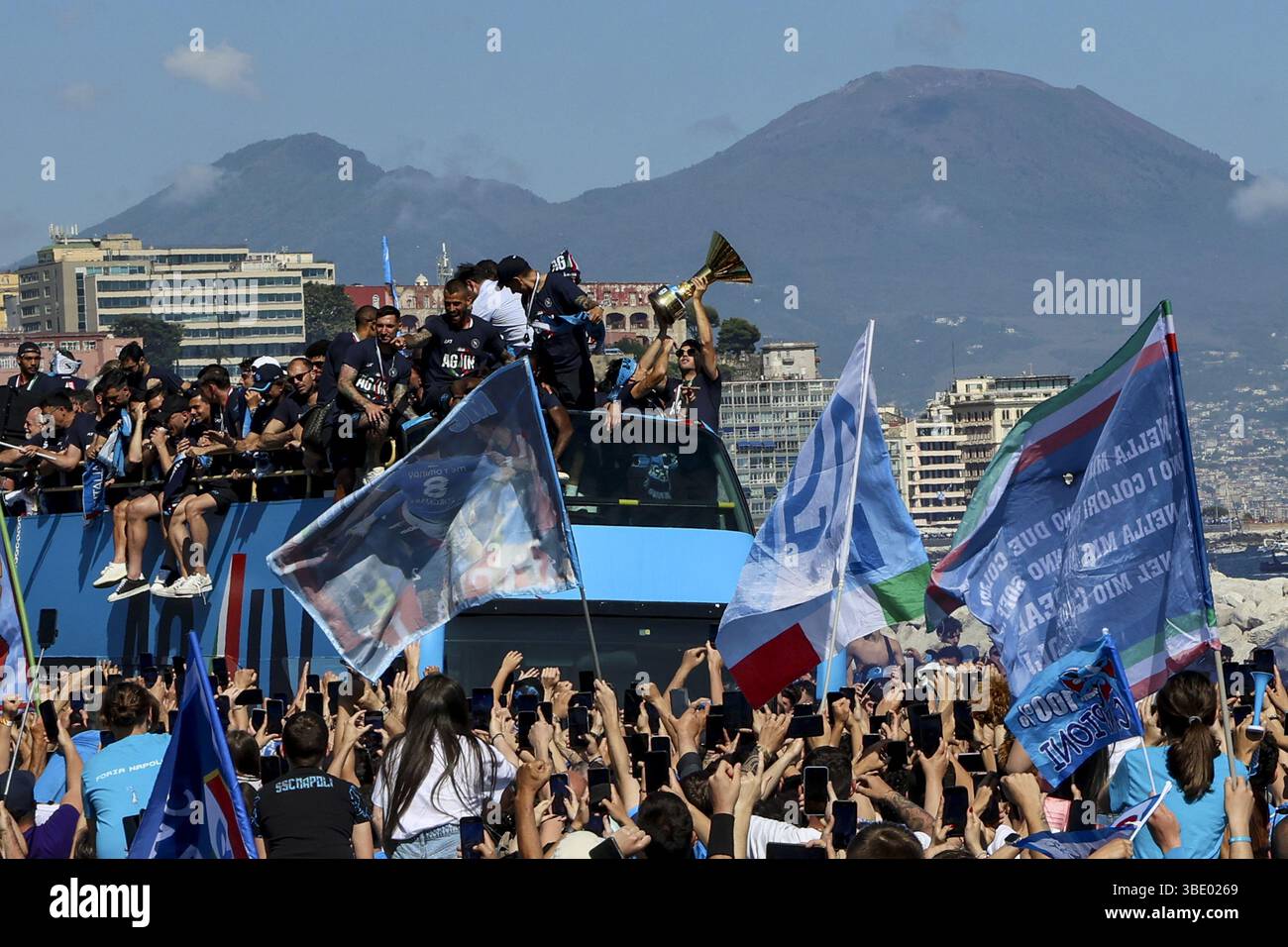Naples, Italy. 26th May, 2025. Napoli players greet fans from atop a ...