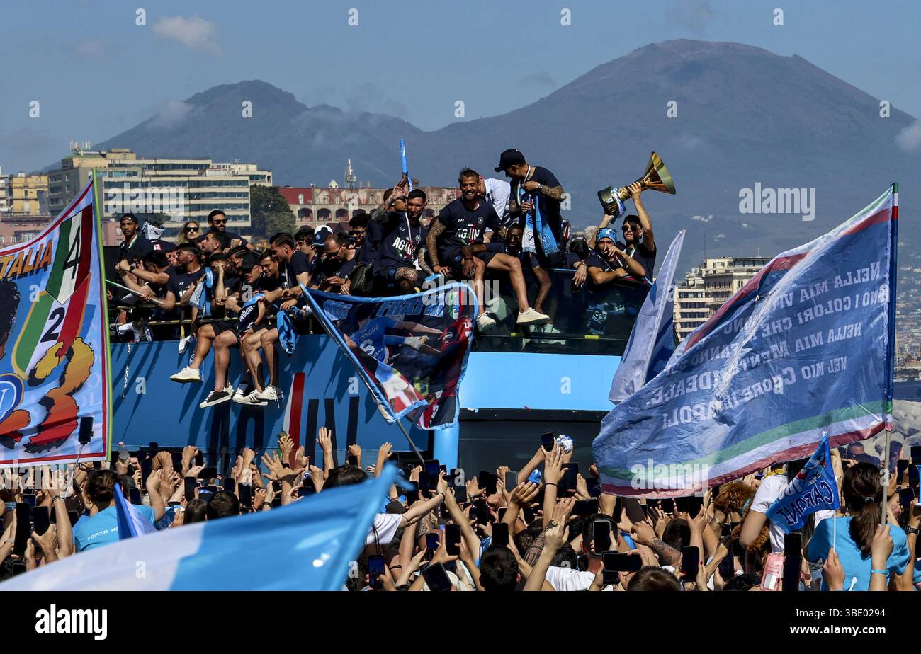 Naples, Italy. 26th May, 2025. Napoli players greet fans from atop a ...