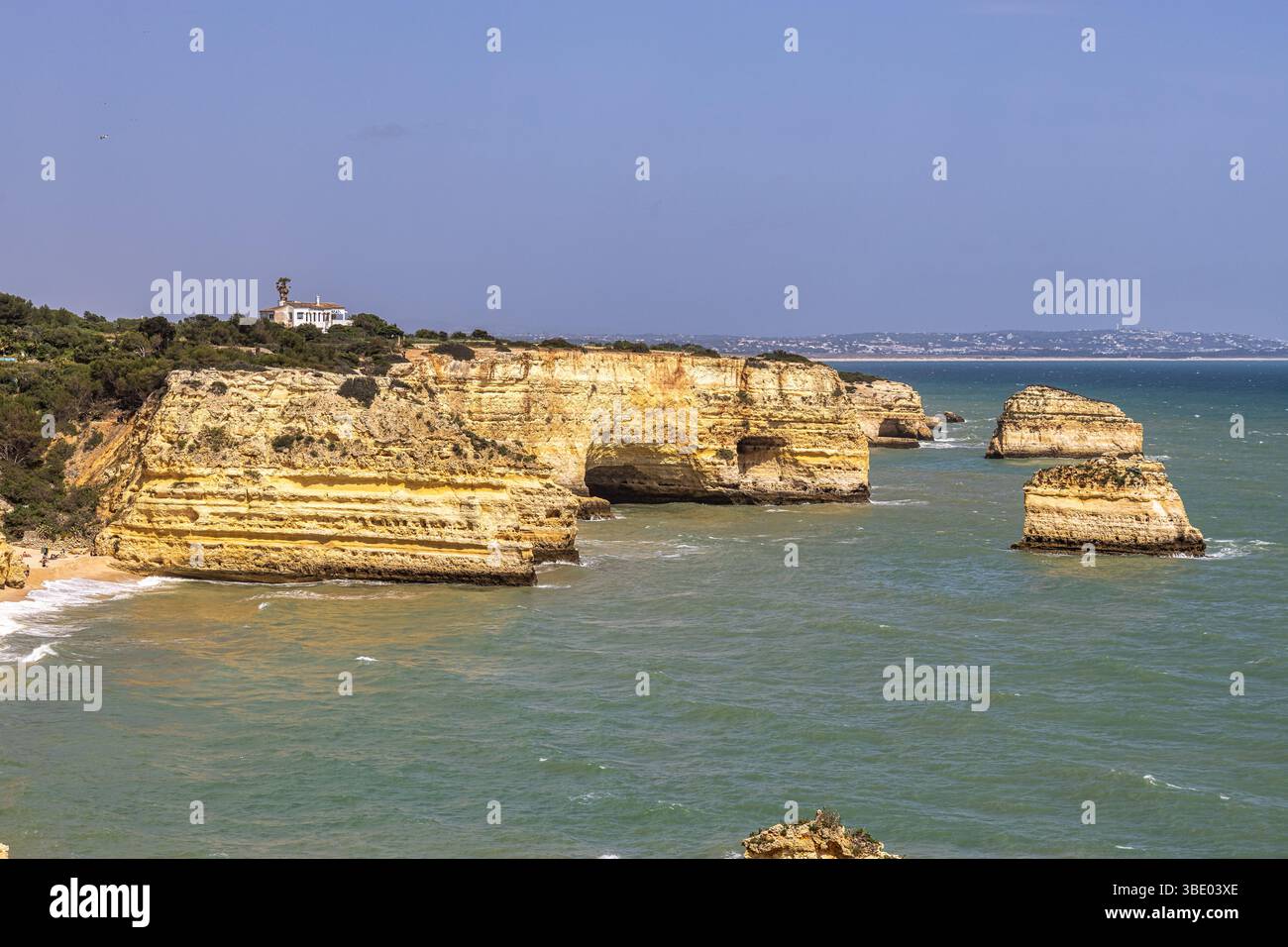 Praia da Marinha Beach among rock islets and cliffs seen from Seven ...