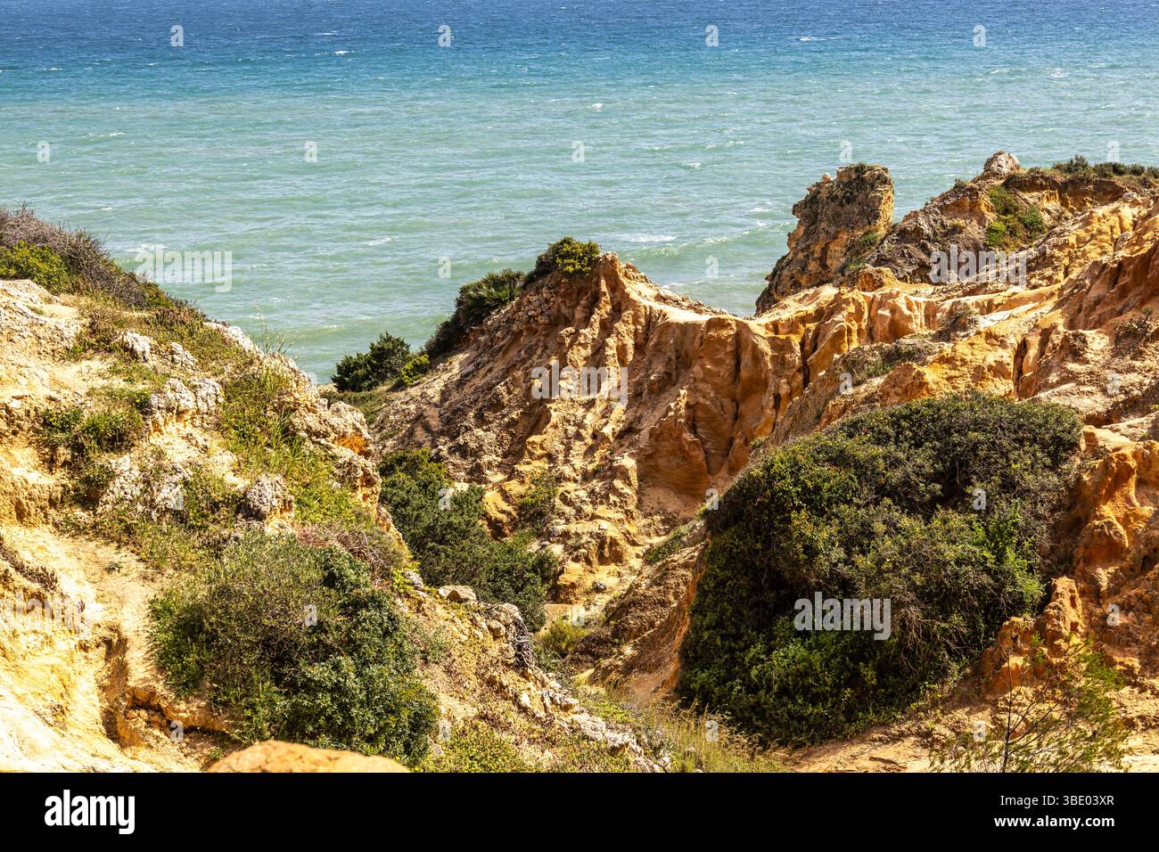 Praia da Marinha Beach among rock islets and cliffs seen from Seven ...