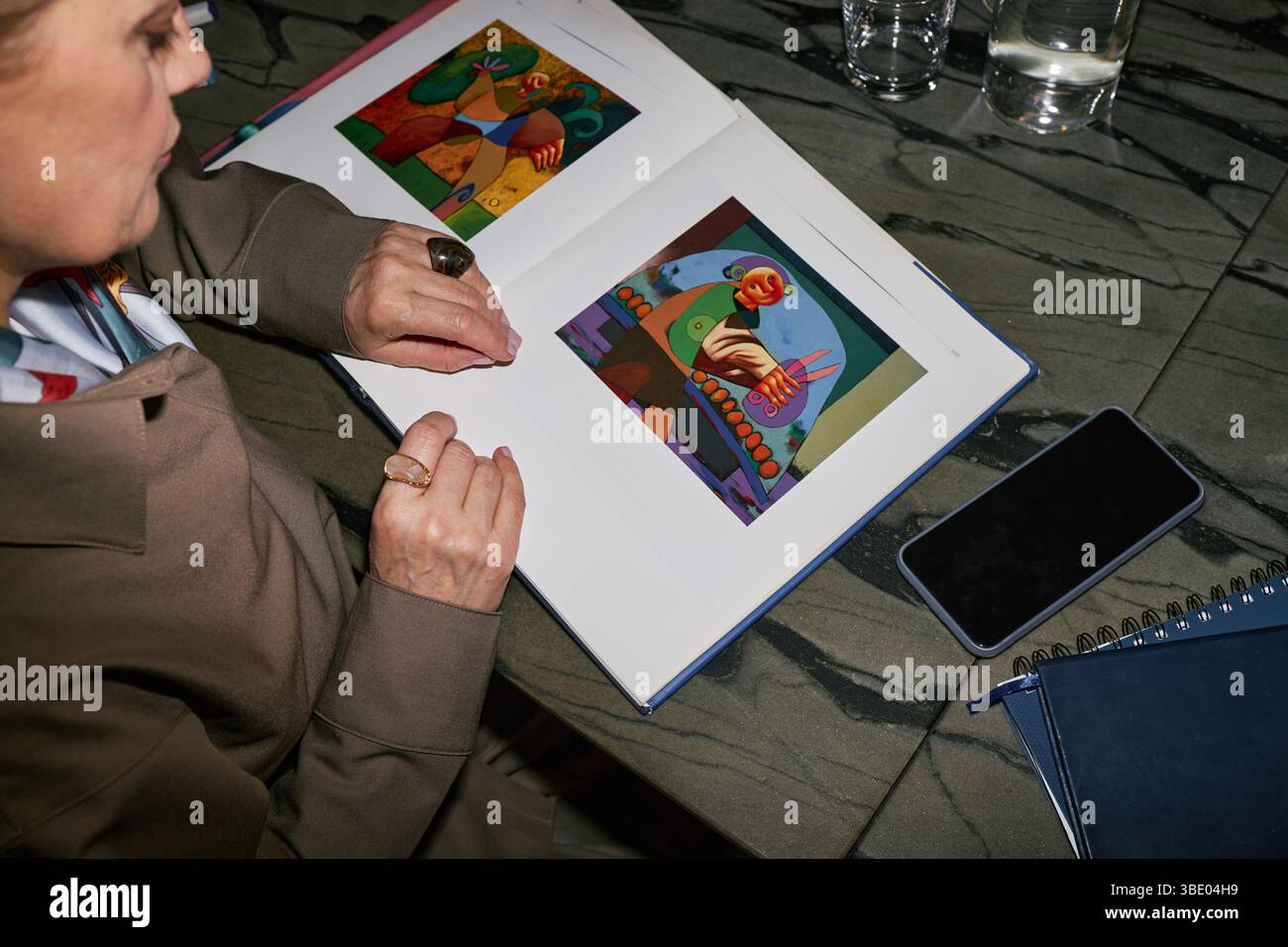 Mature woman reviewing smartphone hi-res stock photography and images ...