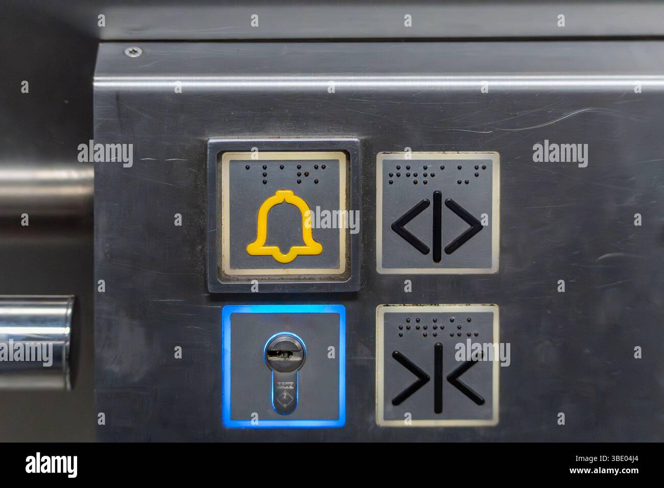 Detailed shot of an elevator with an emergency call button, door ...