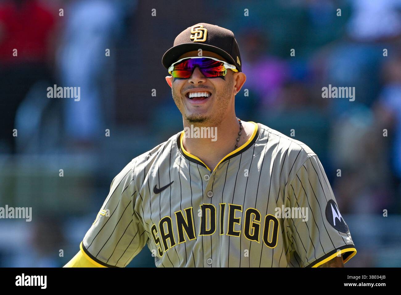 ATLANTA, GA – MAY 24: San Diego third baseman Manny Machado (13) warms ...