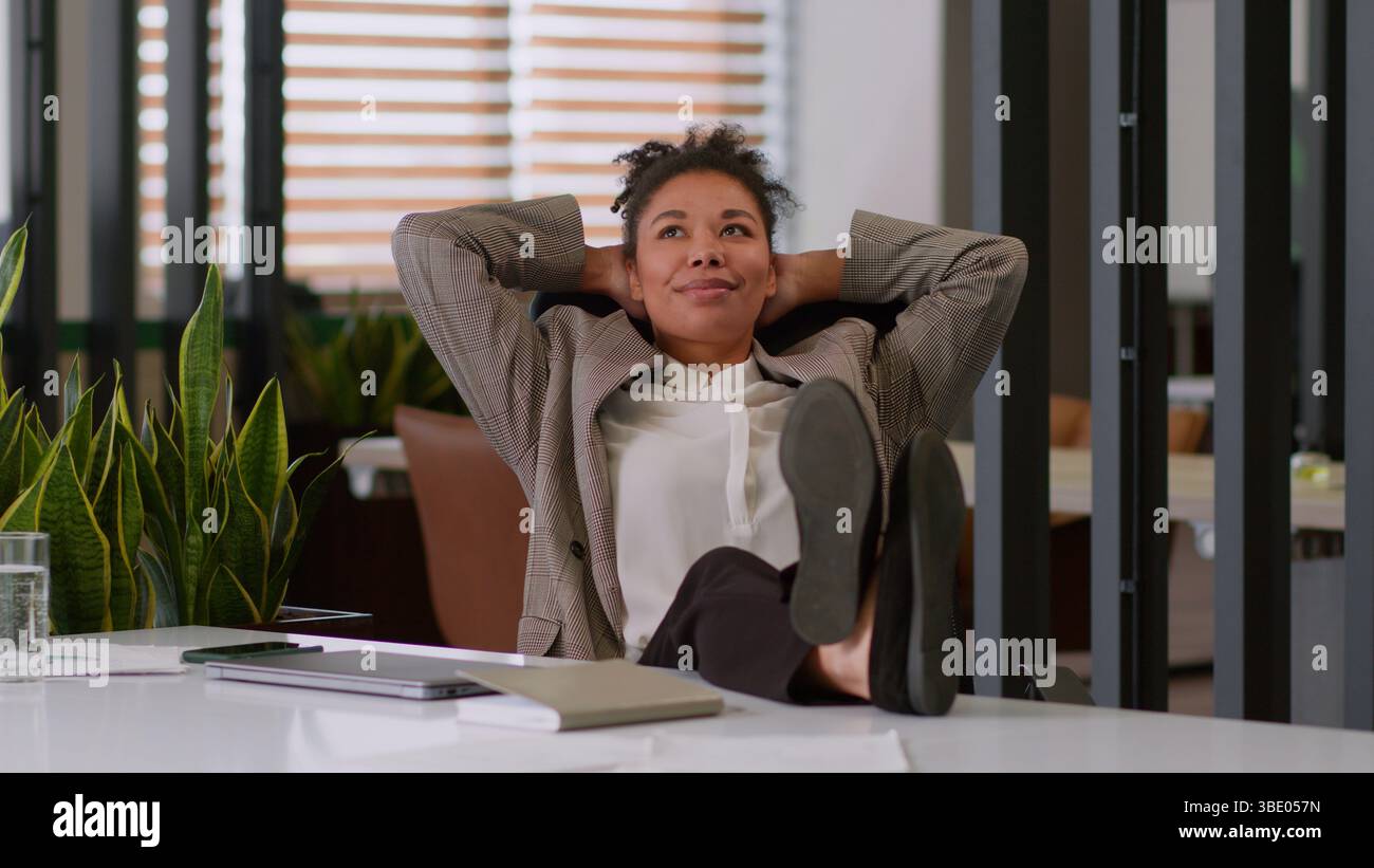 Relaxed businesswoman African American employer business woman girl ...