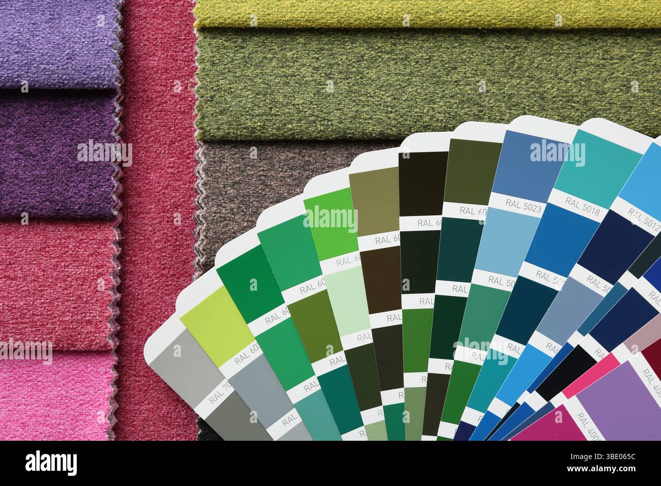 Samples of colorful fabrics and color palettes, top view Stock Photo ...