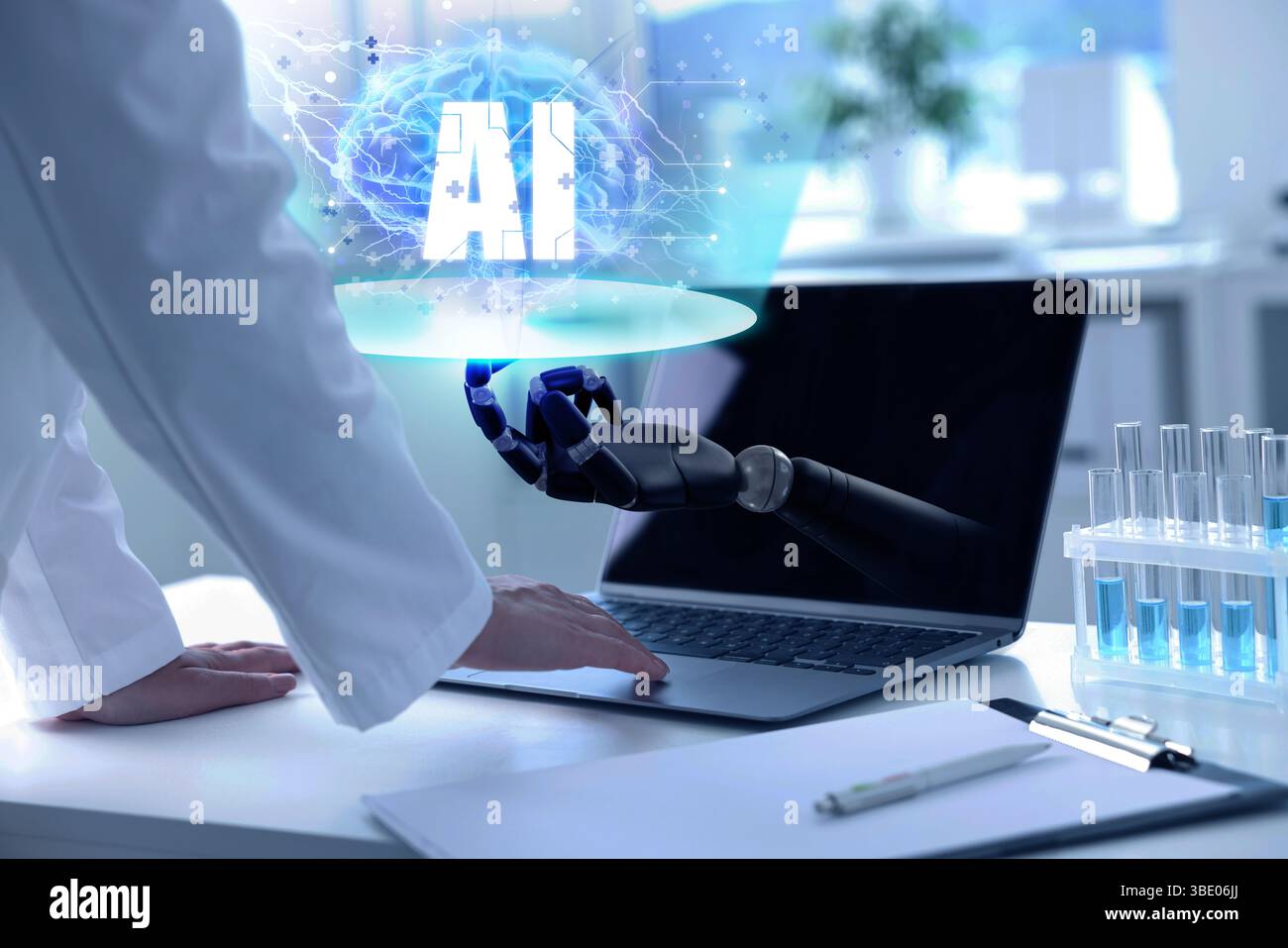 Doctor using laptop at table, closeup. Robot hand sticking out of ...