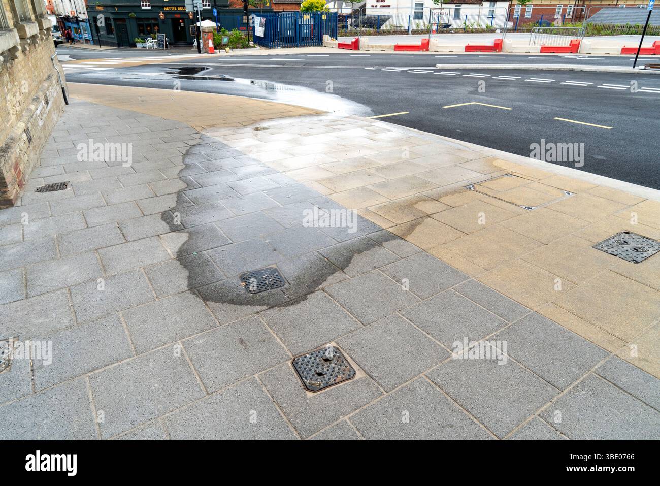 Leaking water main Stock Photo - Alamy