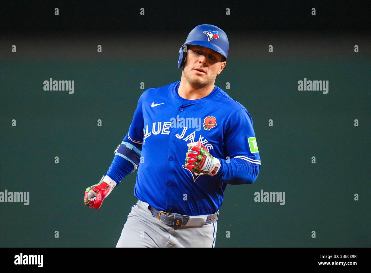 Toronto Blue Jays' Daulton Varsho runs the bases after hitting a solo ...
