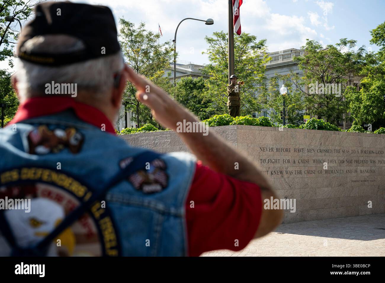 A bugler plays Taps to honor those who died in military service, at the ...
