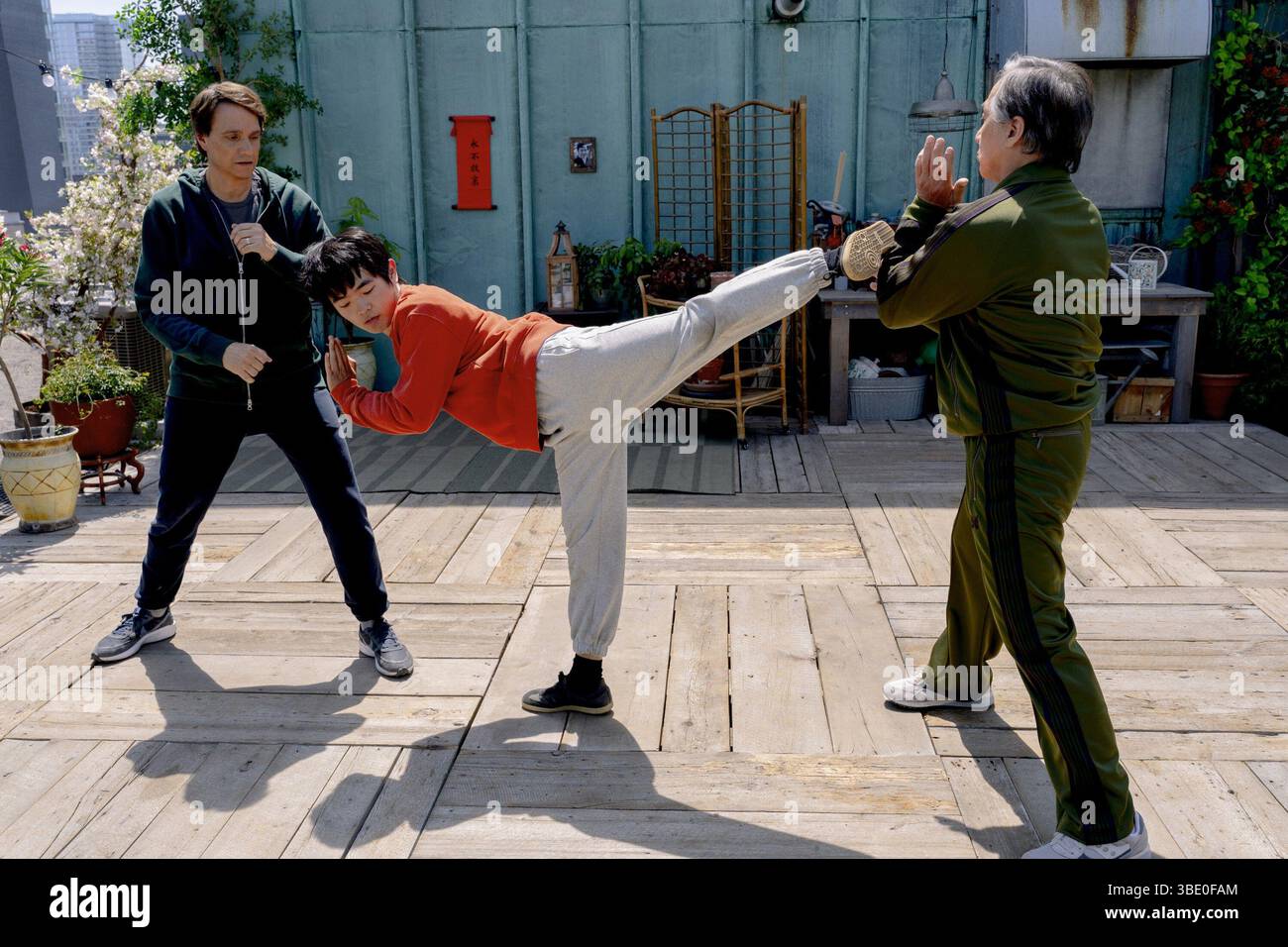 KARATE KID: LEGENDS, from left: Ralph Macchio, Ben Wang, Jackie Chan ...