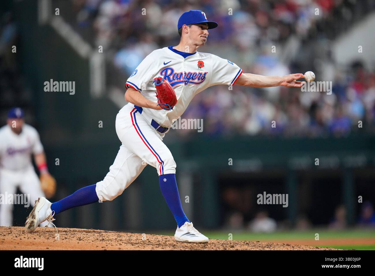 Texas Rangers pitcher Hoby Milner throws a pitch to the Toronto Blue ...