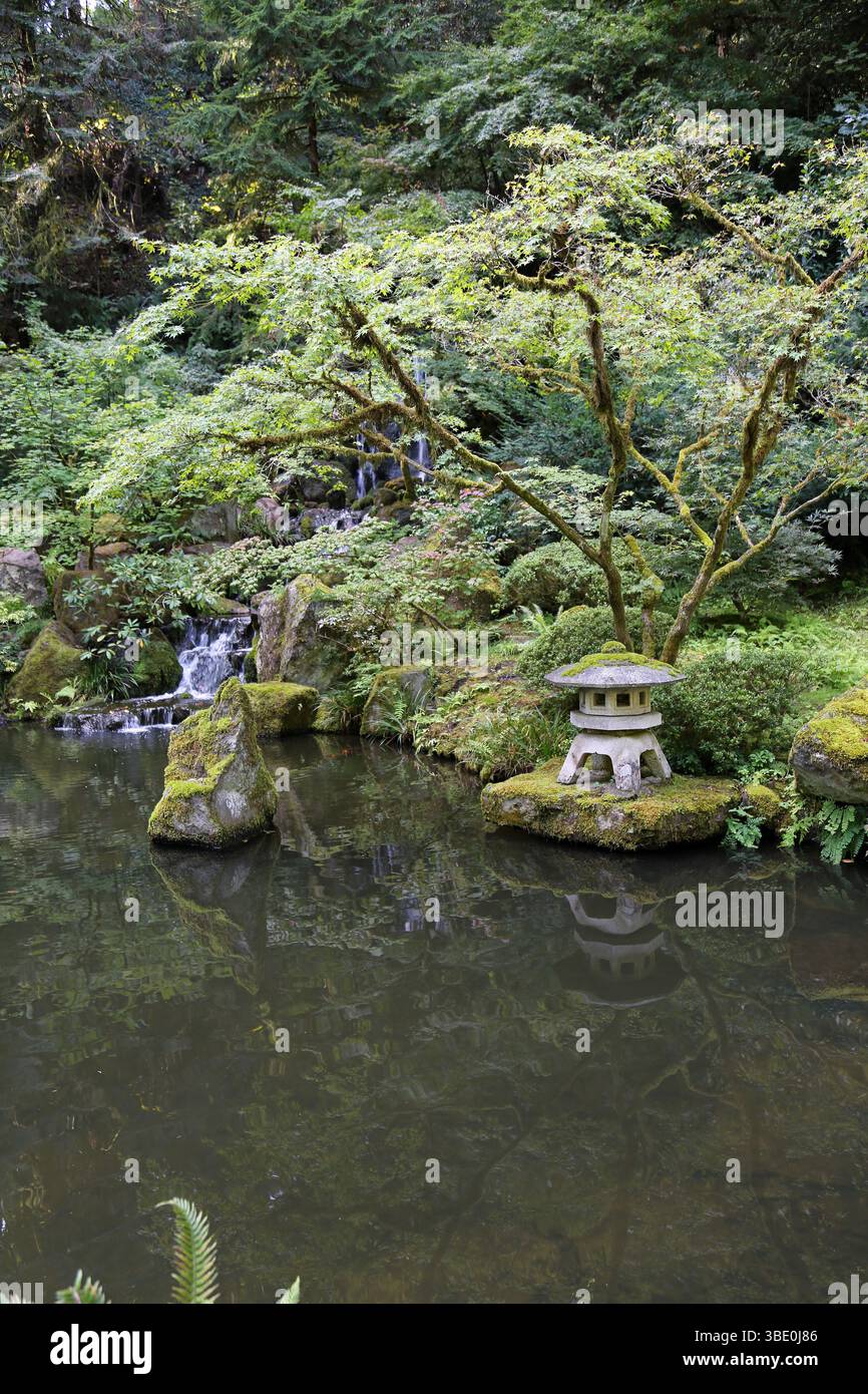 The lantern on the pond vertical - Heavenly Falls - Portland Japanese Garden, Oregon Stock Photo ...