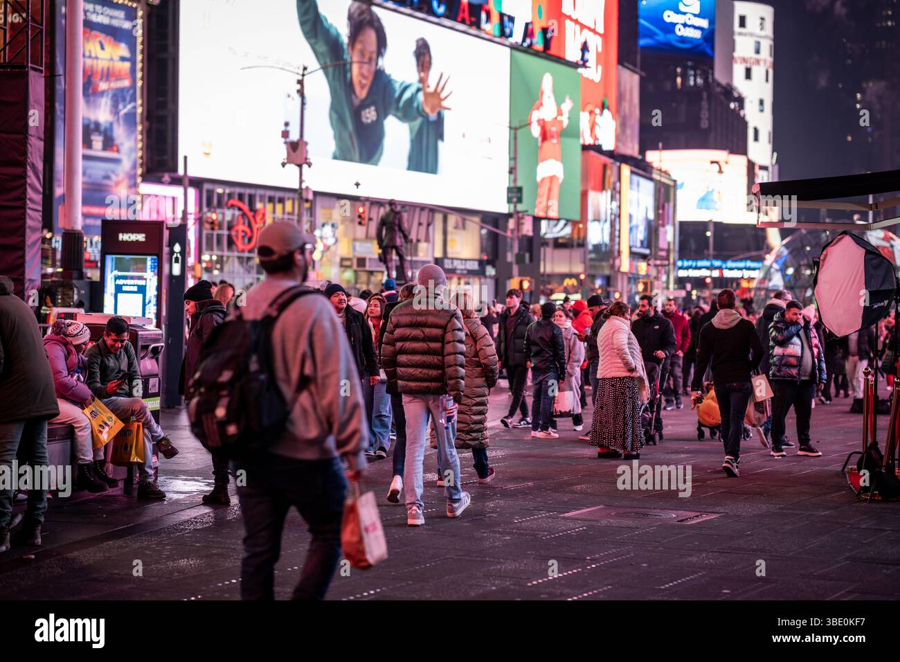 People wlaking in diferent directions at Times Square, New York City ...