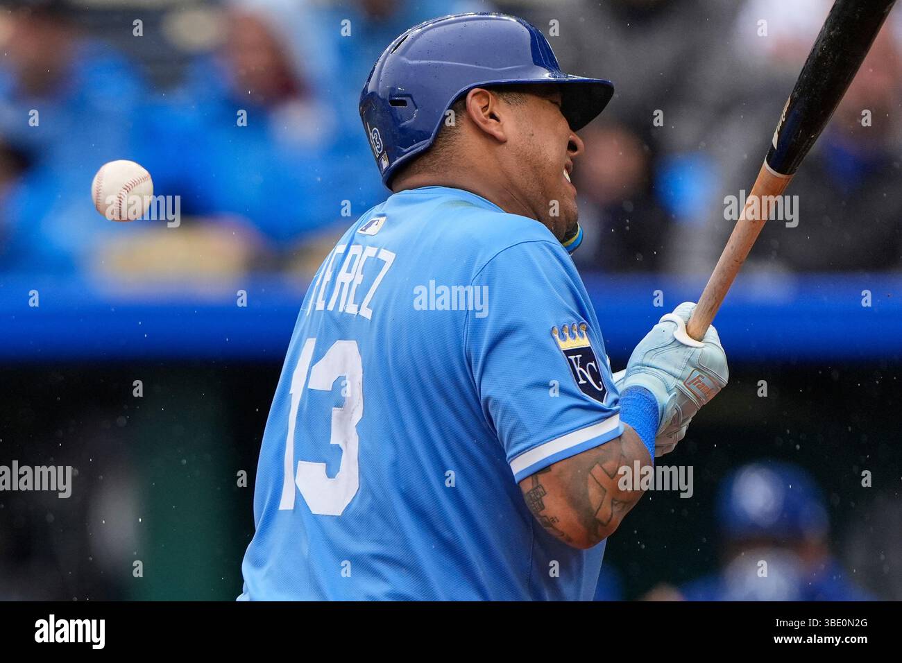 Kansas City Royals' Salvador Perez is hit by a pitch thrown by ...