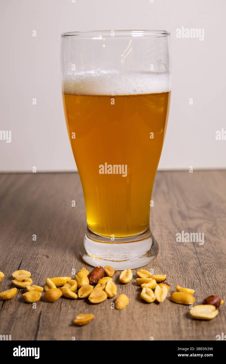 Photo of a ice cold beer in a pilsner glass. Great shot for an ad Stock ...