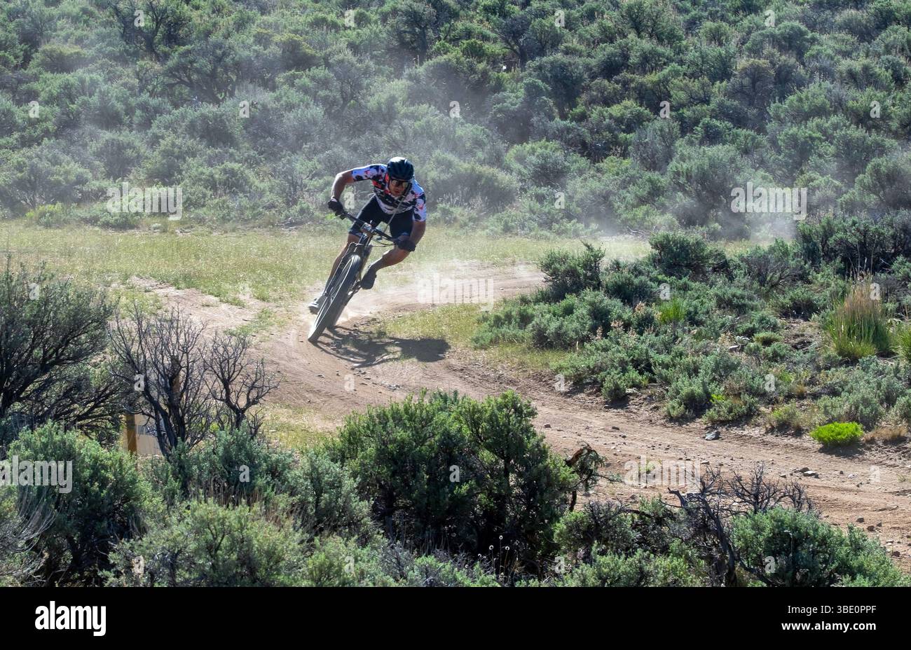 May 25, 2025. A mountain biker powers his way toward Skull Pass during ...