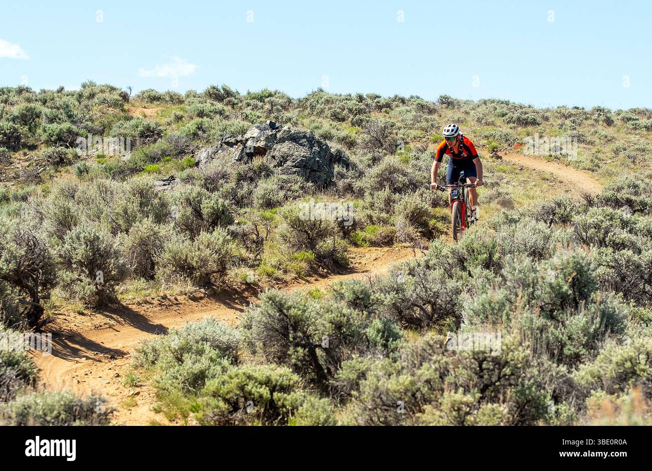 May 25, 2025. Gunnison's, Jacob Dewey, crosses through difficult high ...