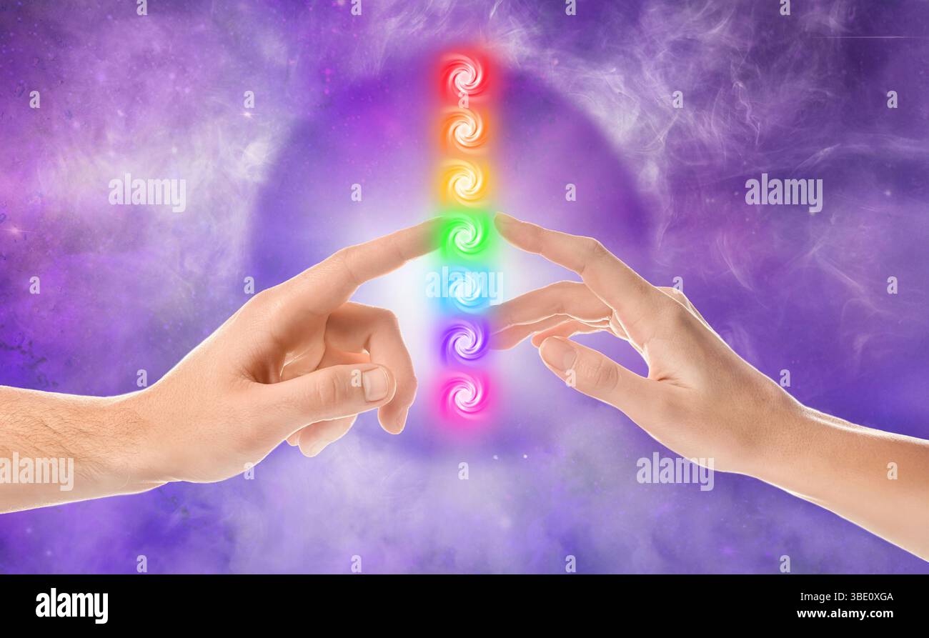Hands with shining energy of chakras on color background Stock Photo ...