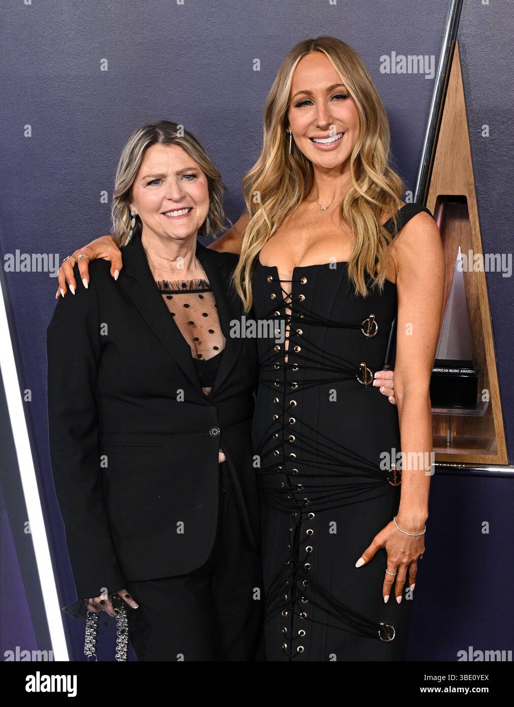 Las Vegas, USA. 26th May, 2025. Julie E. Glaser and Nikki Glaser ...