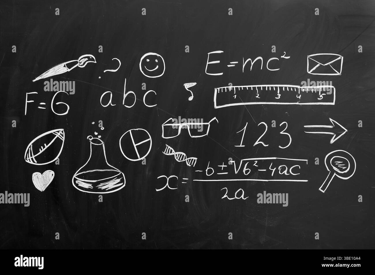 Many drawings on school chalkboard Stock Photo - Alamy