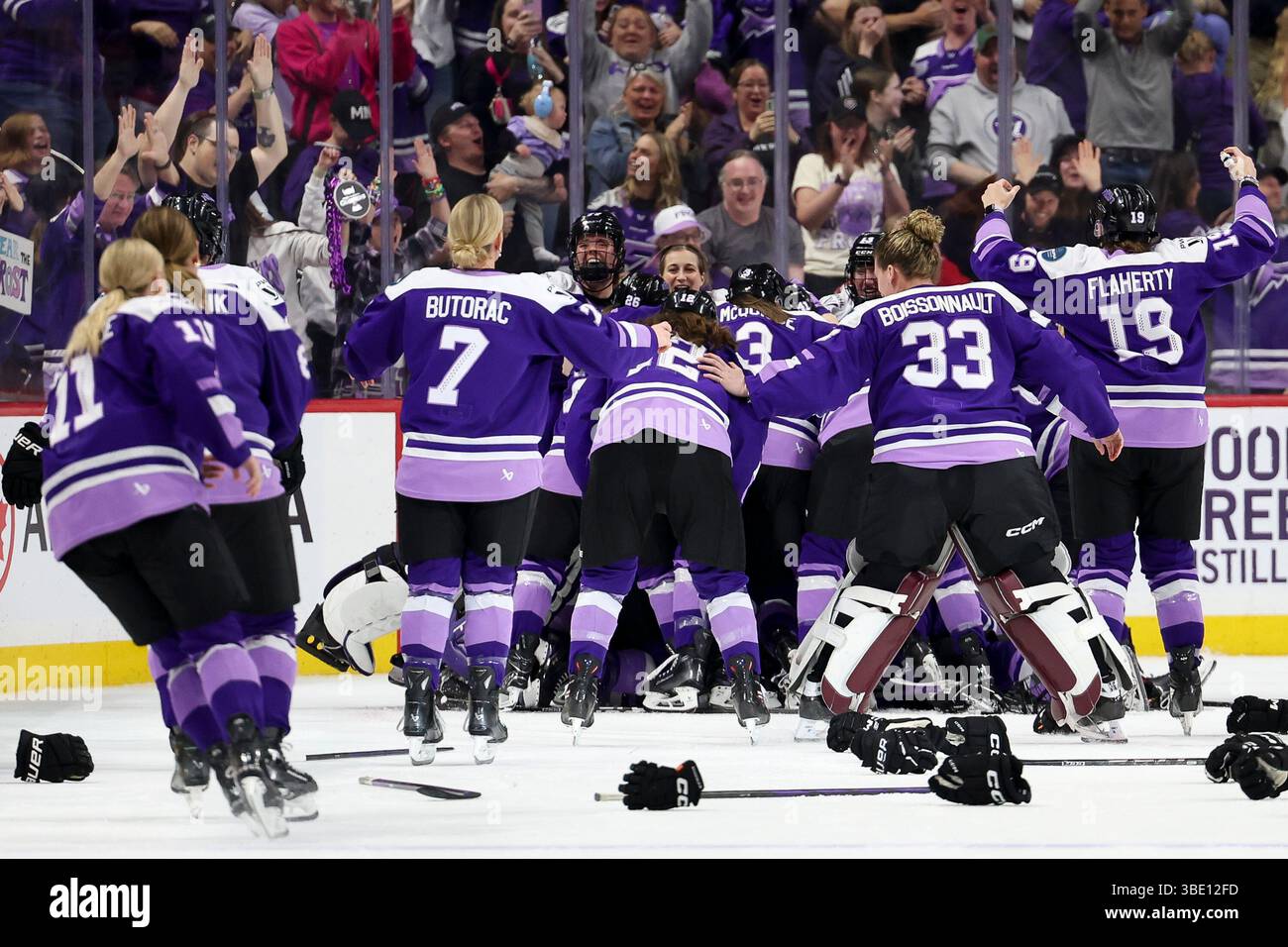 The Minnesota Frost celebrate after winning Game 4 of the PWHL hockey ...