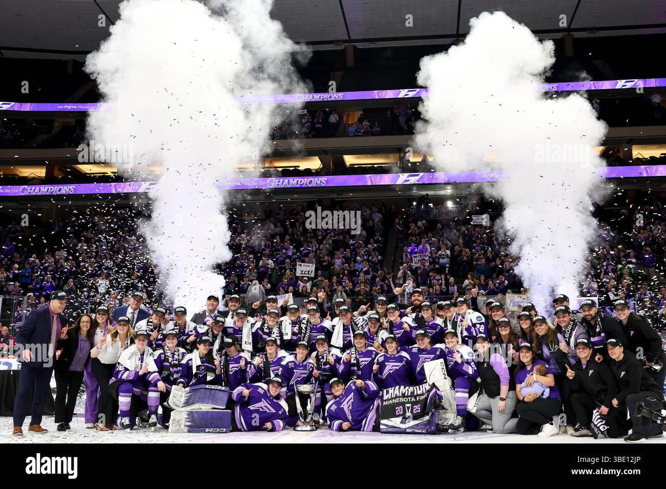 The Minnesota Frost pose for photos after winning the PWHL hockey finals against the Ottawa ...