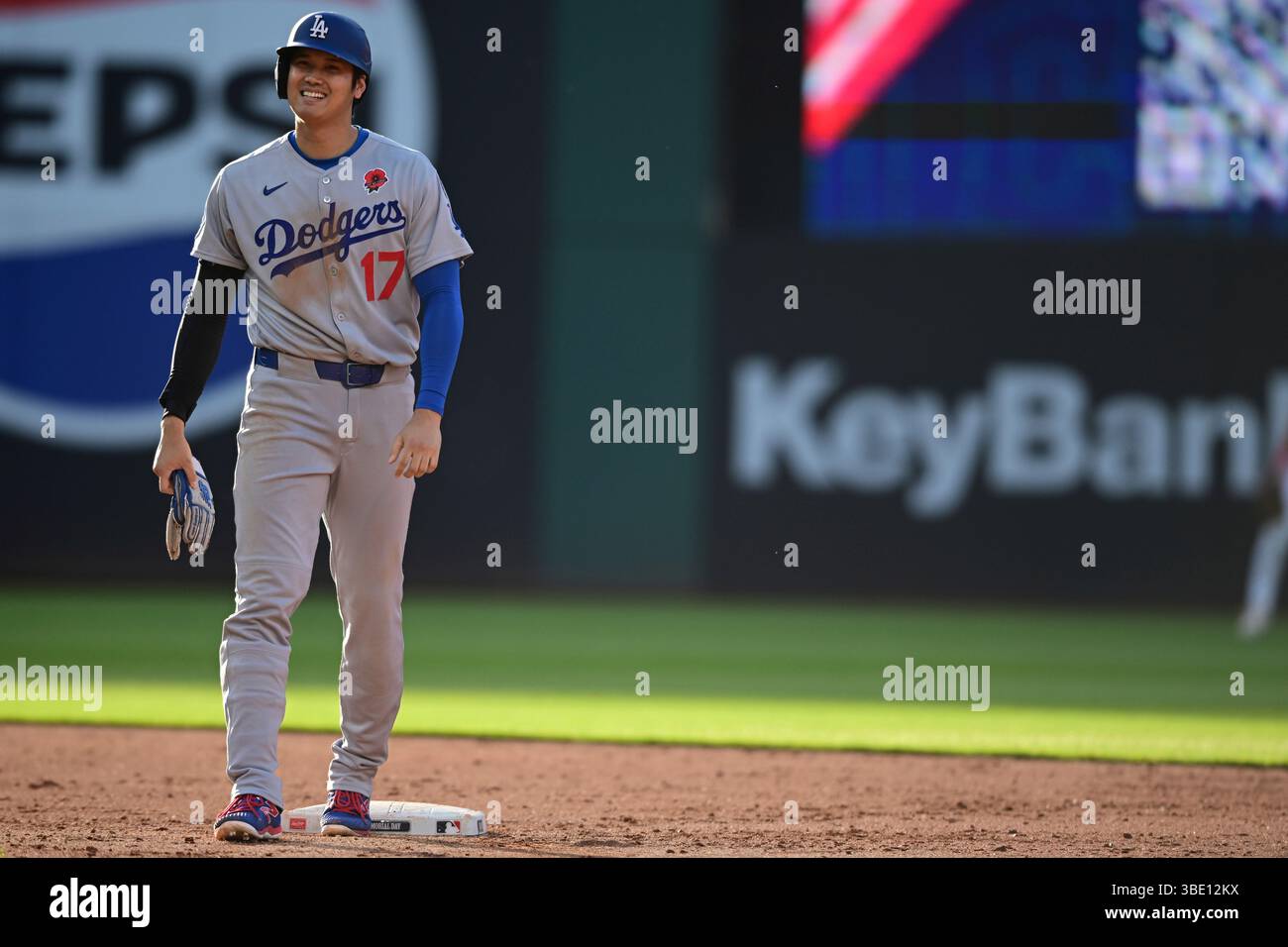 Los Angeles Dodgers' Shohei Ohtani smiles during the fifth inning of a ...