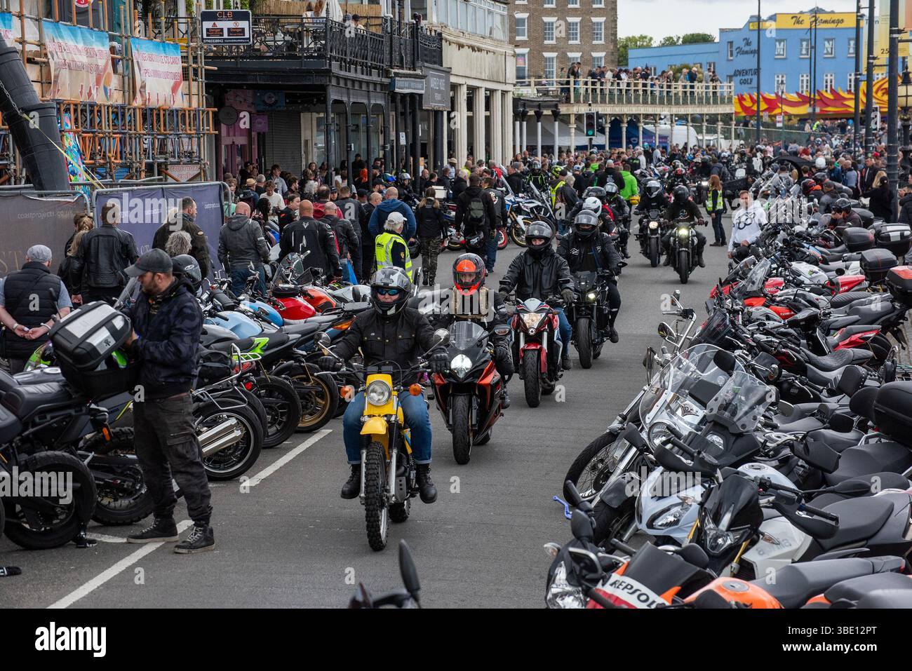 Margate, UK. 26th May, 2025. The bikers ride between the parked ...